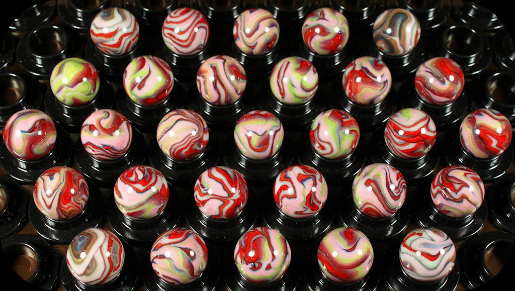 Such a pretty marble! RAINBOW PINKY - ALL ABOUT MARBLES